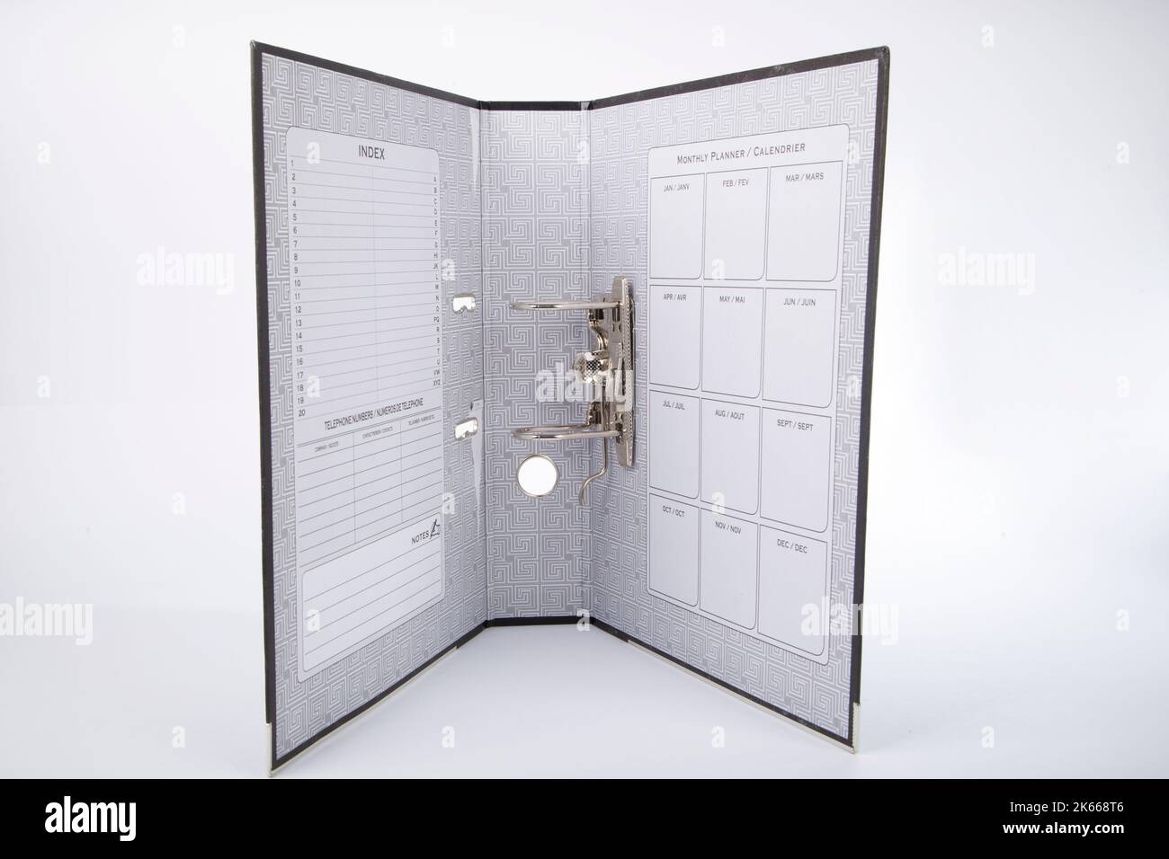 An open empty lever arch file isolated on white background with space ...