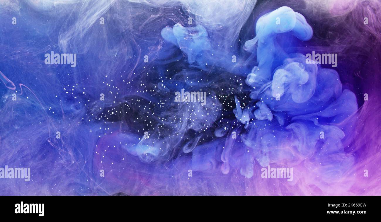 ink water color fluid splash blue purple paint Stock Photo - Alamy