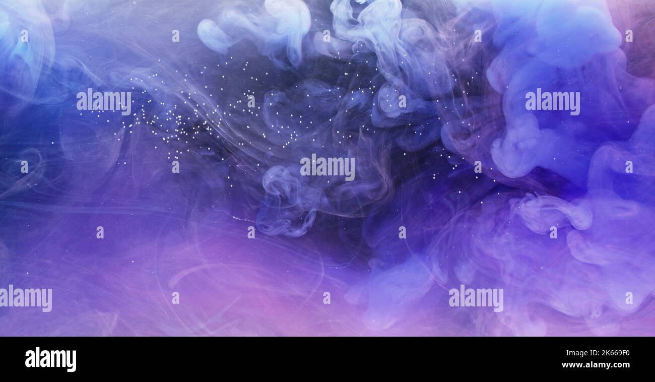 ink water color fluid splash blue purple paint Stock Photo - Alamy