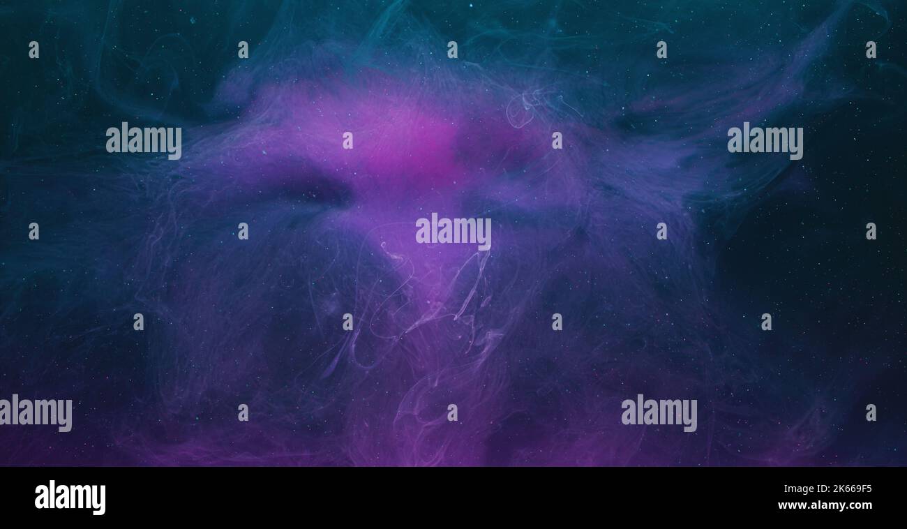 color fluid mix smoke cloud motion purple blue ink Stock Photo - Alamy