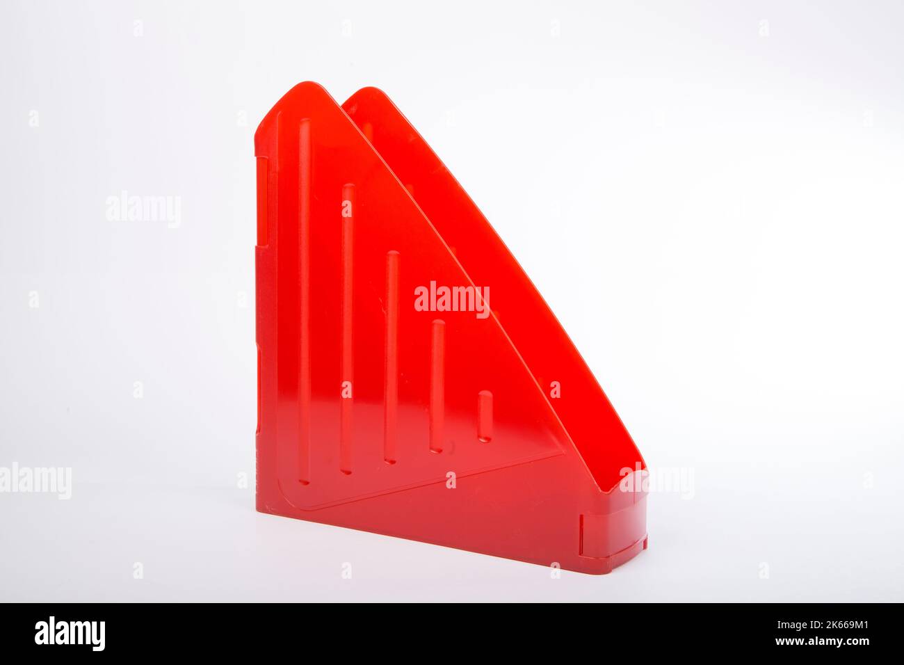 A red office desk file holder isolated on white background Stock Photo ...