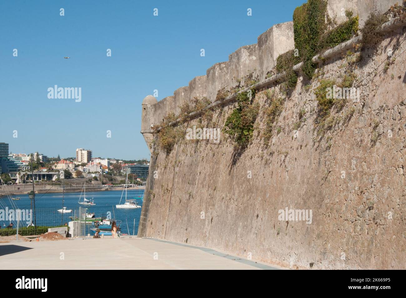 Small boats in Cascais Bay, Cascais, Portugal; Fortress of Nossa ...