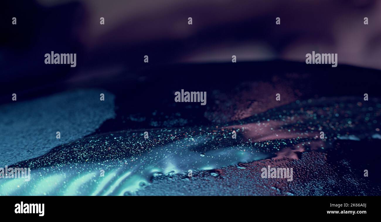 glitter fluid wet ink texture blue paint Stock Photo - Alamy