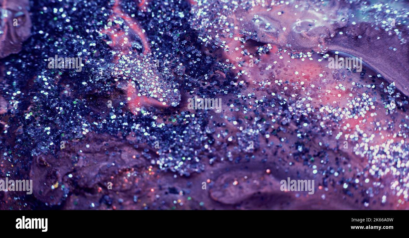 glitter ink background paint mix pink purple Stock Photo - Alamy