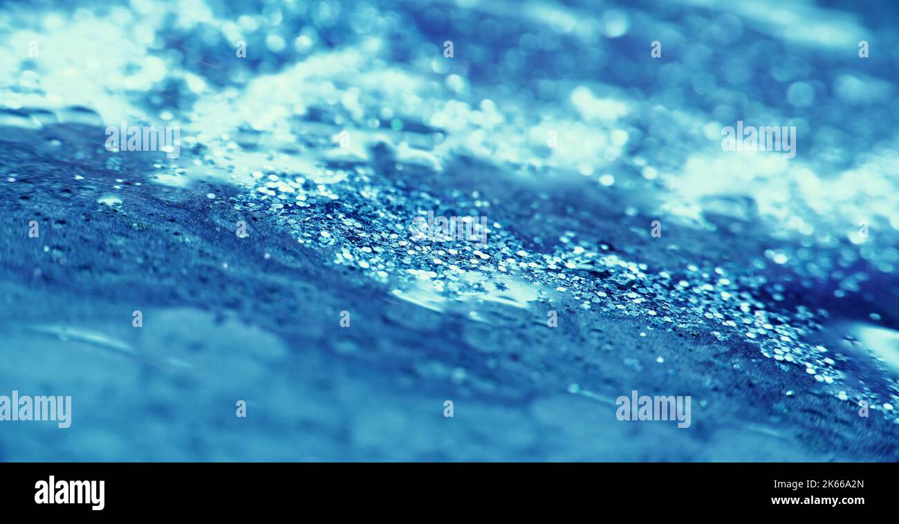 Glitter fluid acrylic paint motion blue liquid paint Stock Photo - Alamy