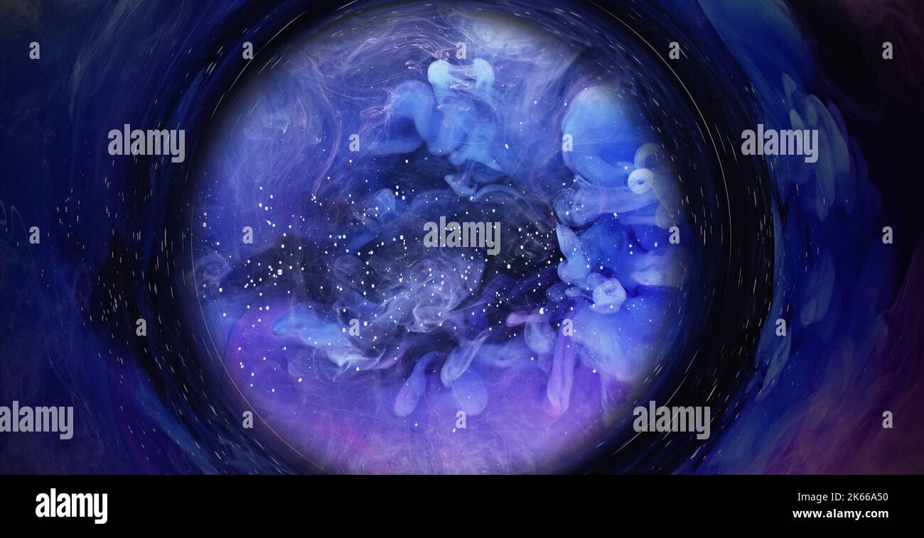 ink water drop color mist flow blue purple fume mix Stock Photo - Alamy