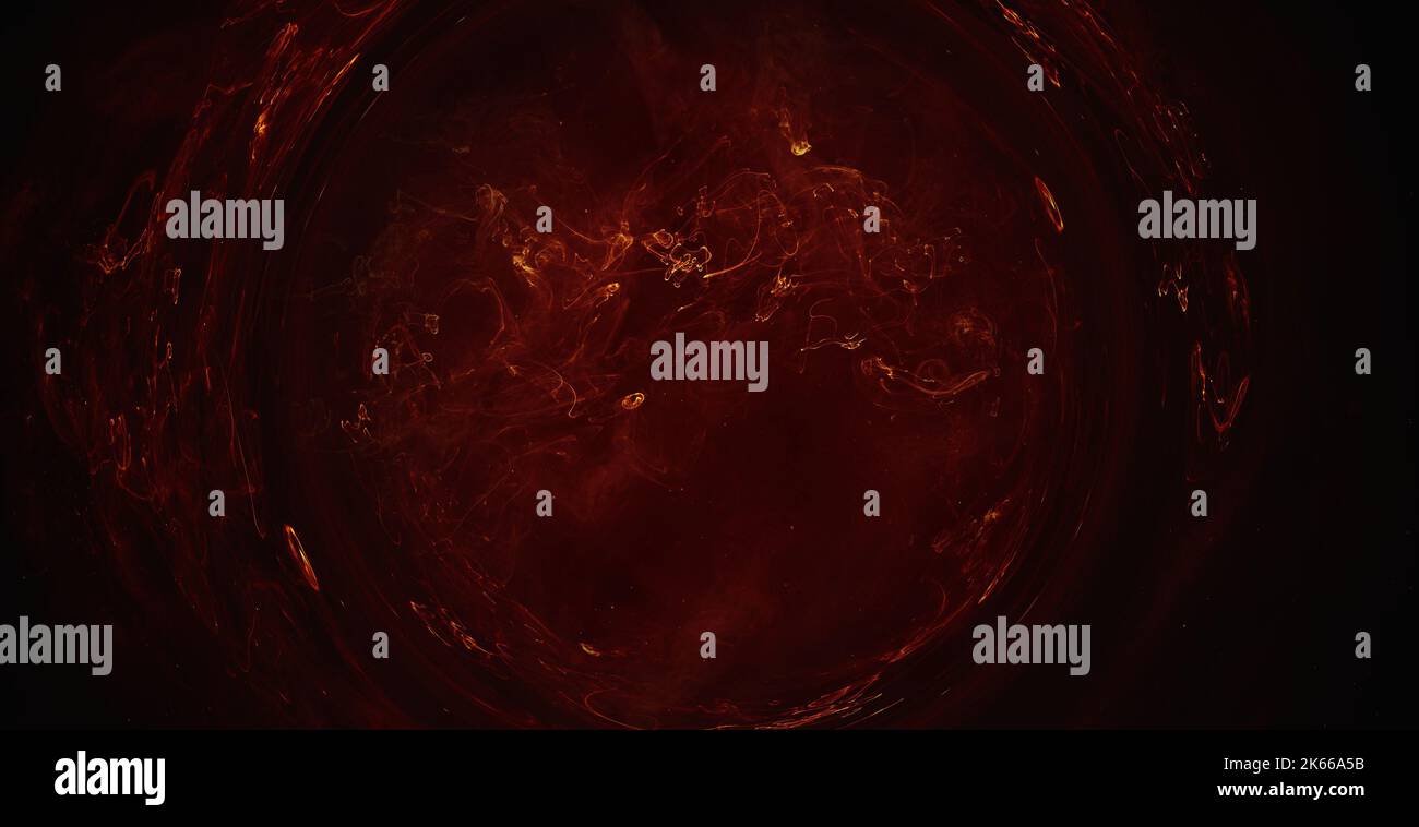 ink water drop color mist flow orange fume mix Stock Photo - Alamy