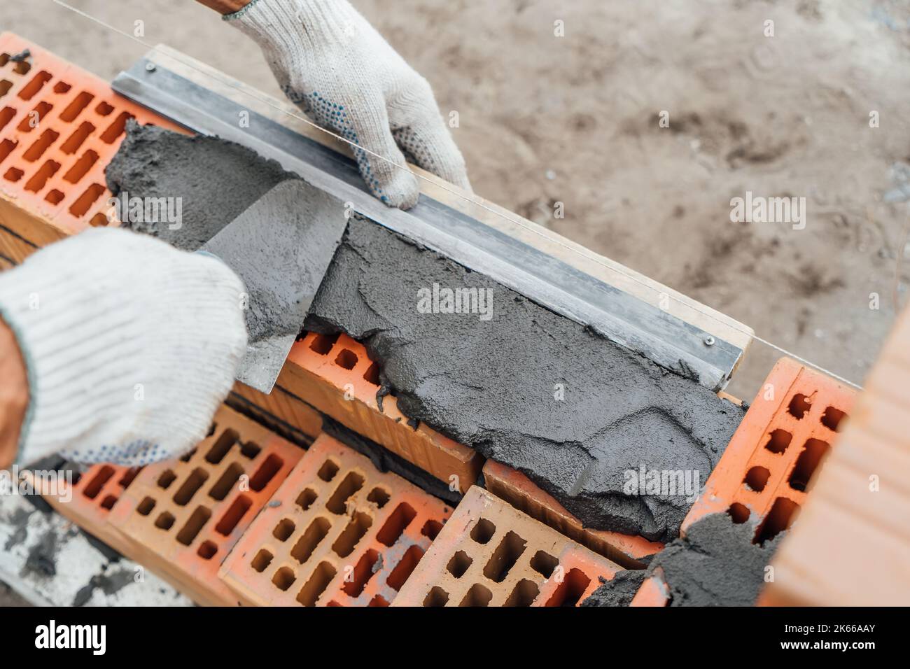 Builder laying bricks close up hi-res stock photography and images - Alamy