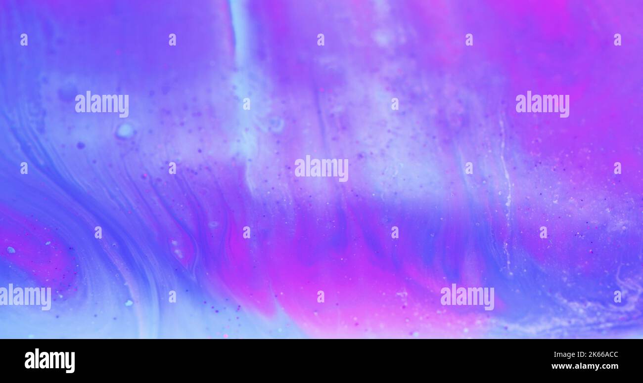 ink wave color splash iridescent purple dye blend Stock Photo - Alamy
