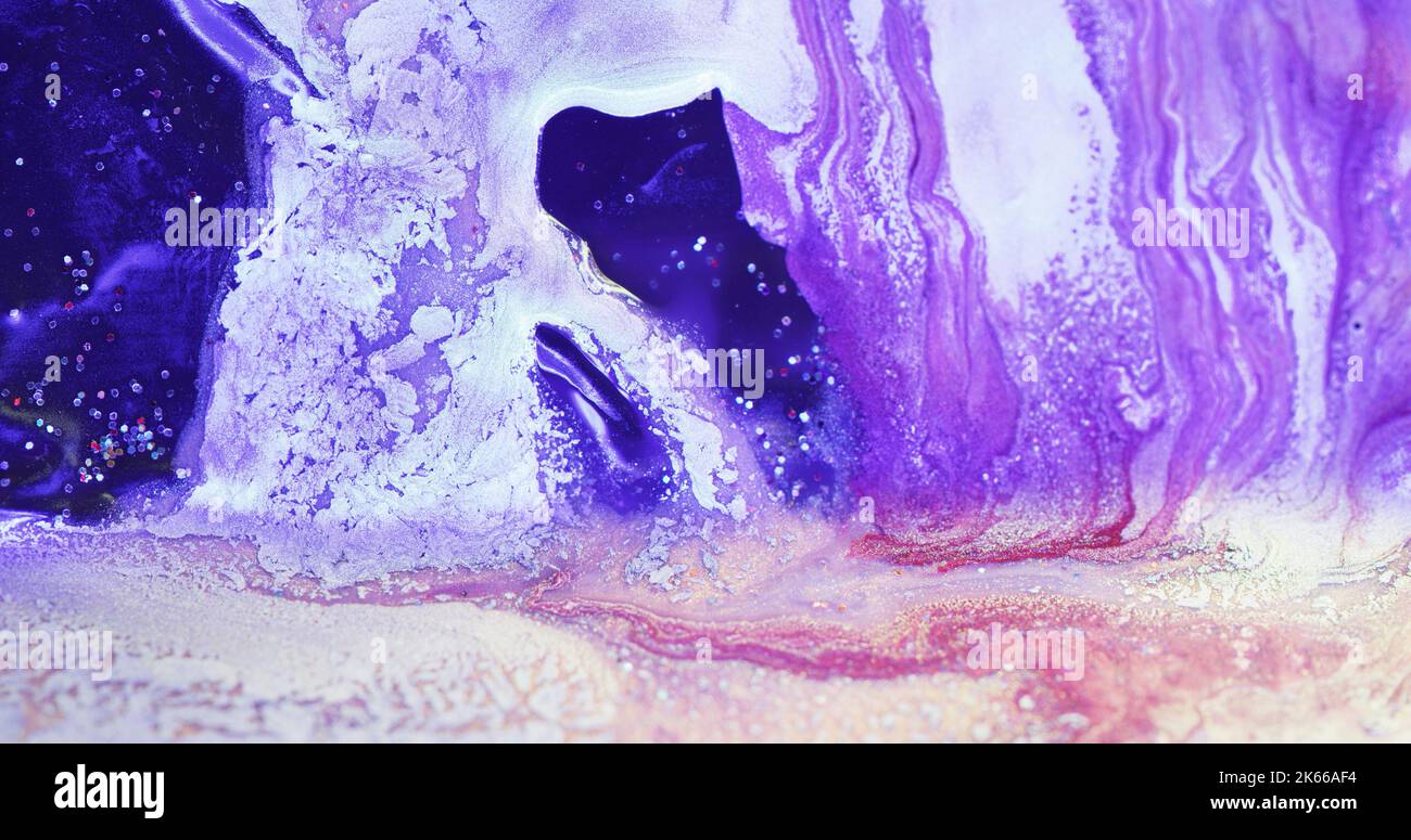 floating paint acrylic ink mix purple blue fluid Stock Photo - Alamy