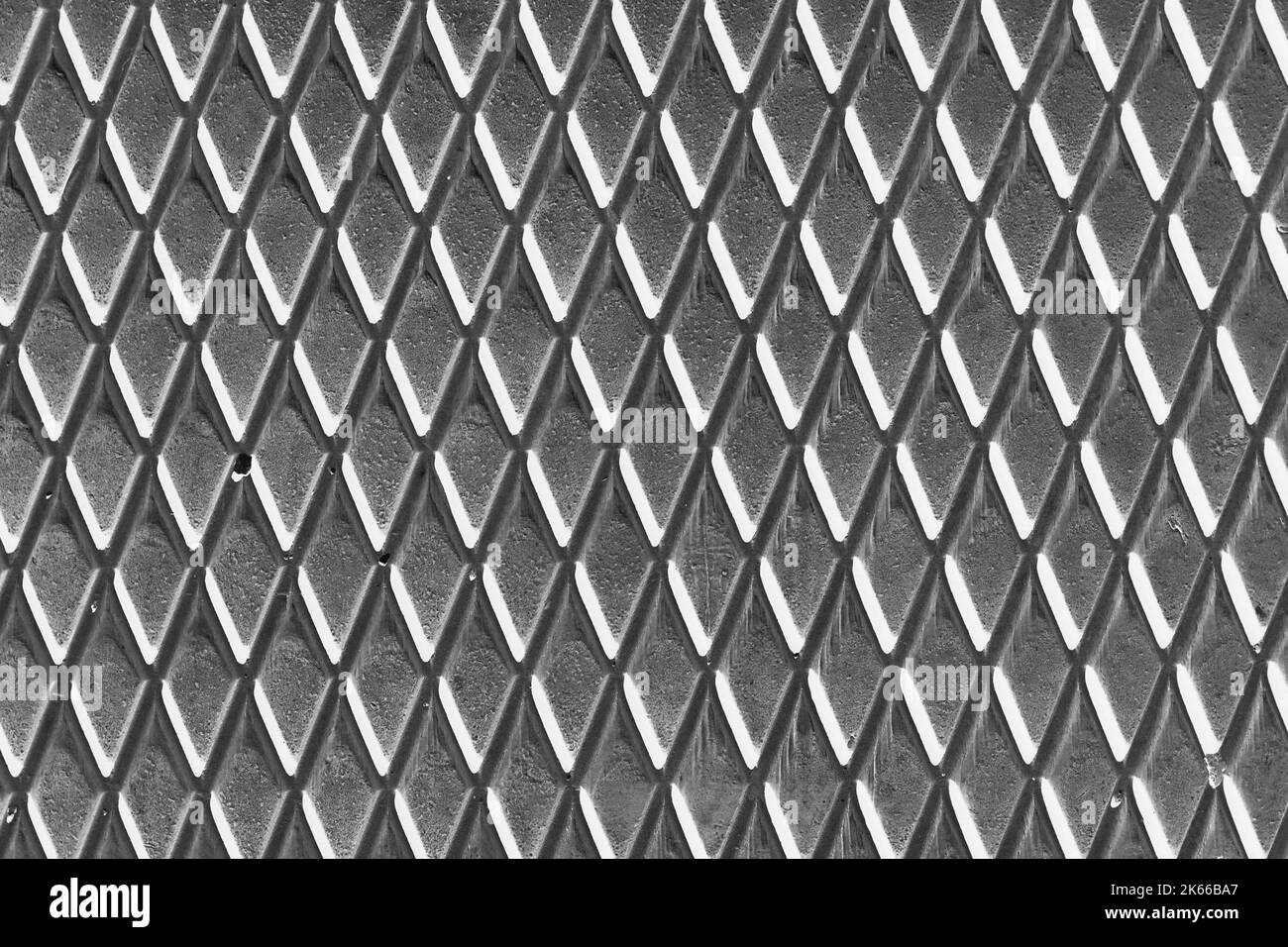 Repeating diamond grid pattern in a black and white monochrome Stock ...