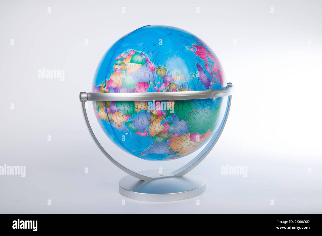 A reduced model of the Earth world globe atlas on a white background ...