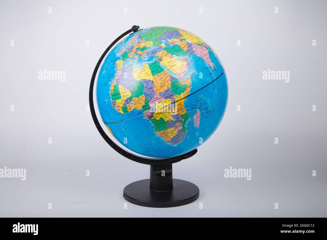 A reduced model of the Earth world globe atlas on a white background ...
