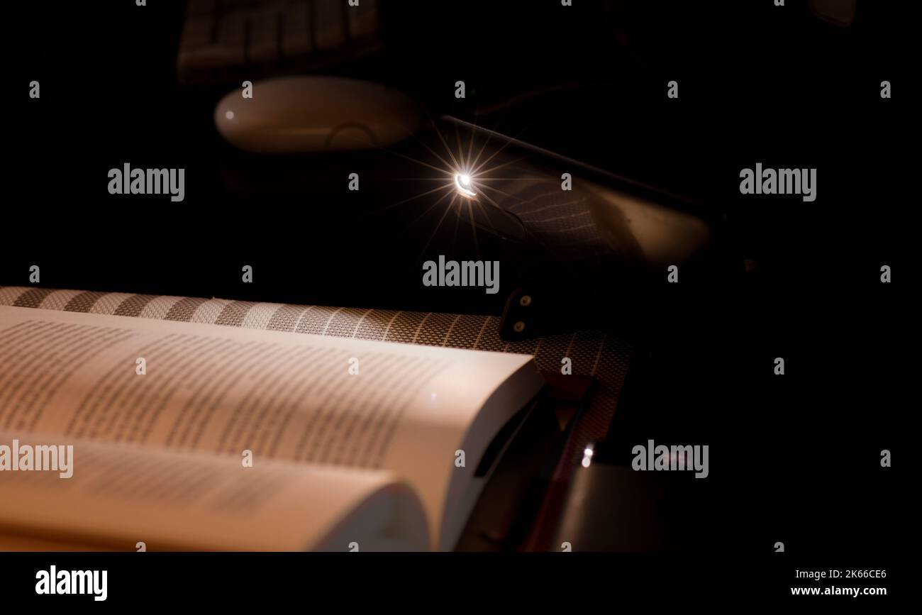 cell phone and power bank on the desk illuminates reading and study ...