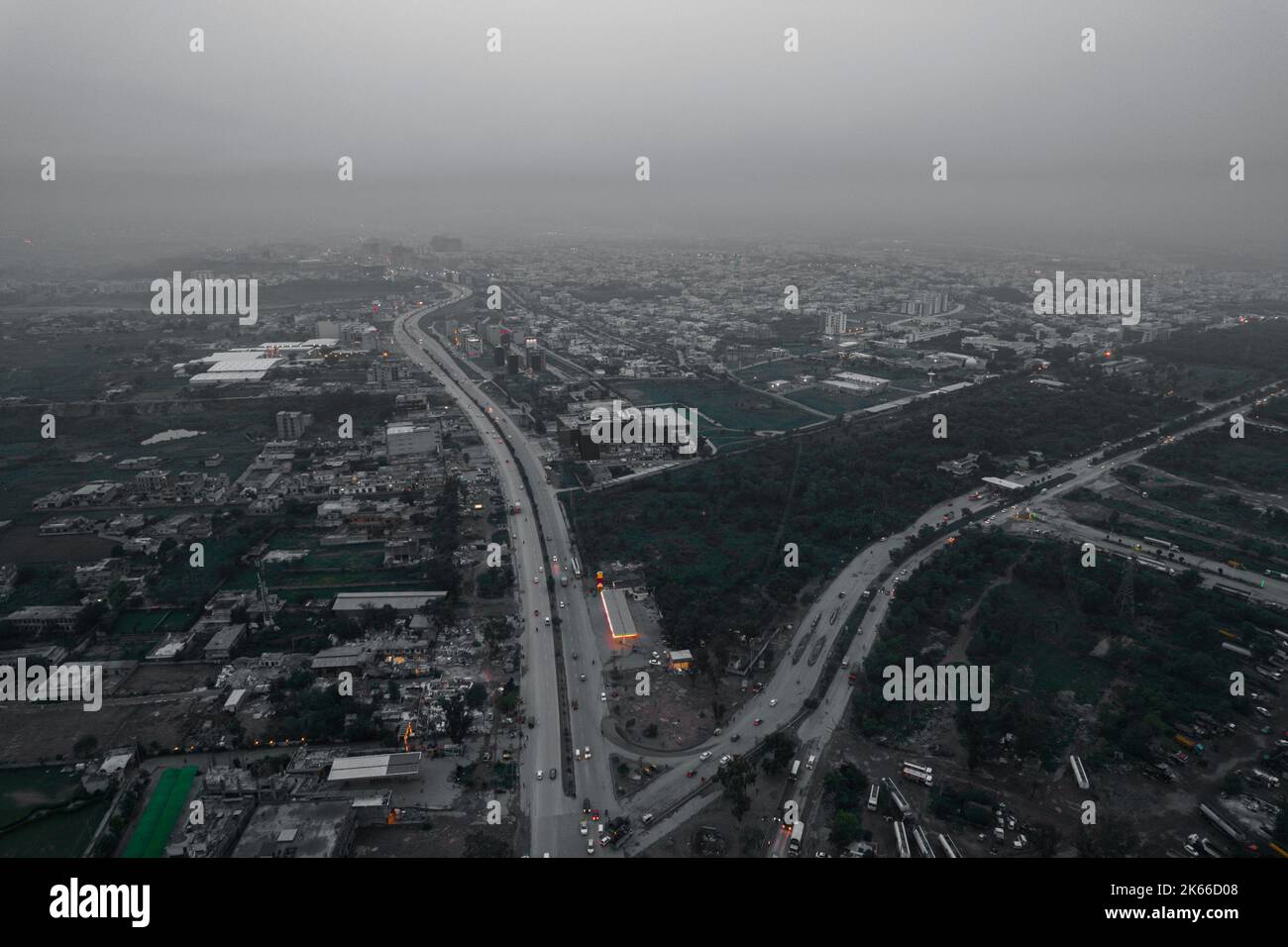 An aerial view of a highway passing through the city of Islamabad ...