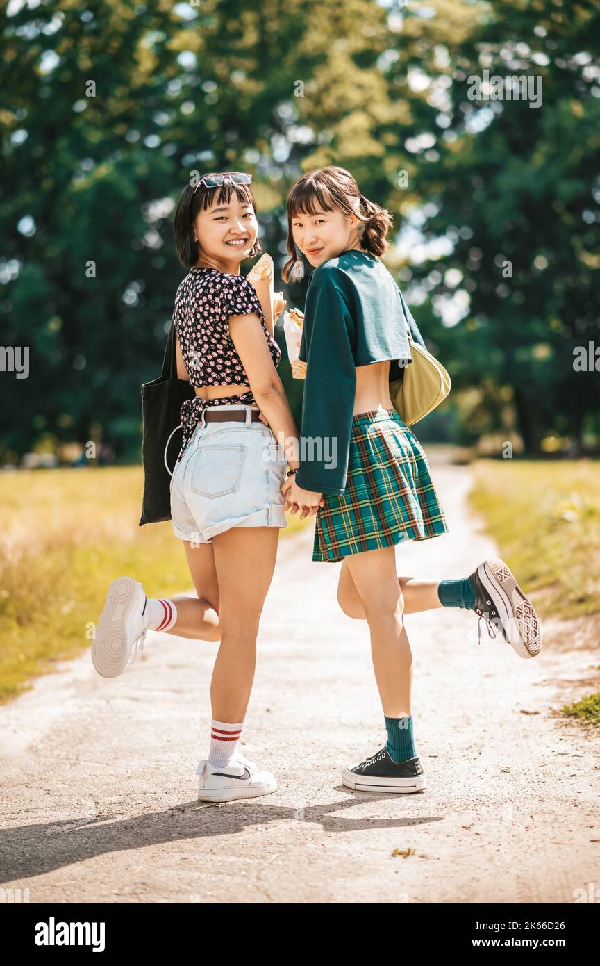Sweet girls looking happy and ejoyed while spending time together Stock ...
