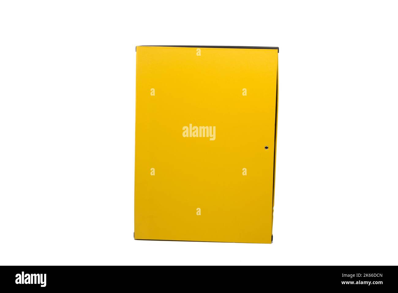 A yellow closed clip box file for holding documents isolated on white ...