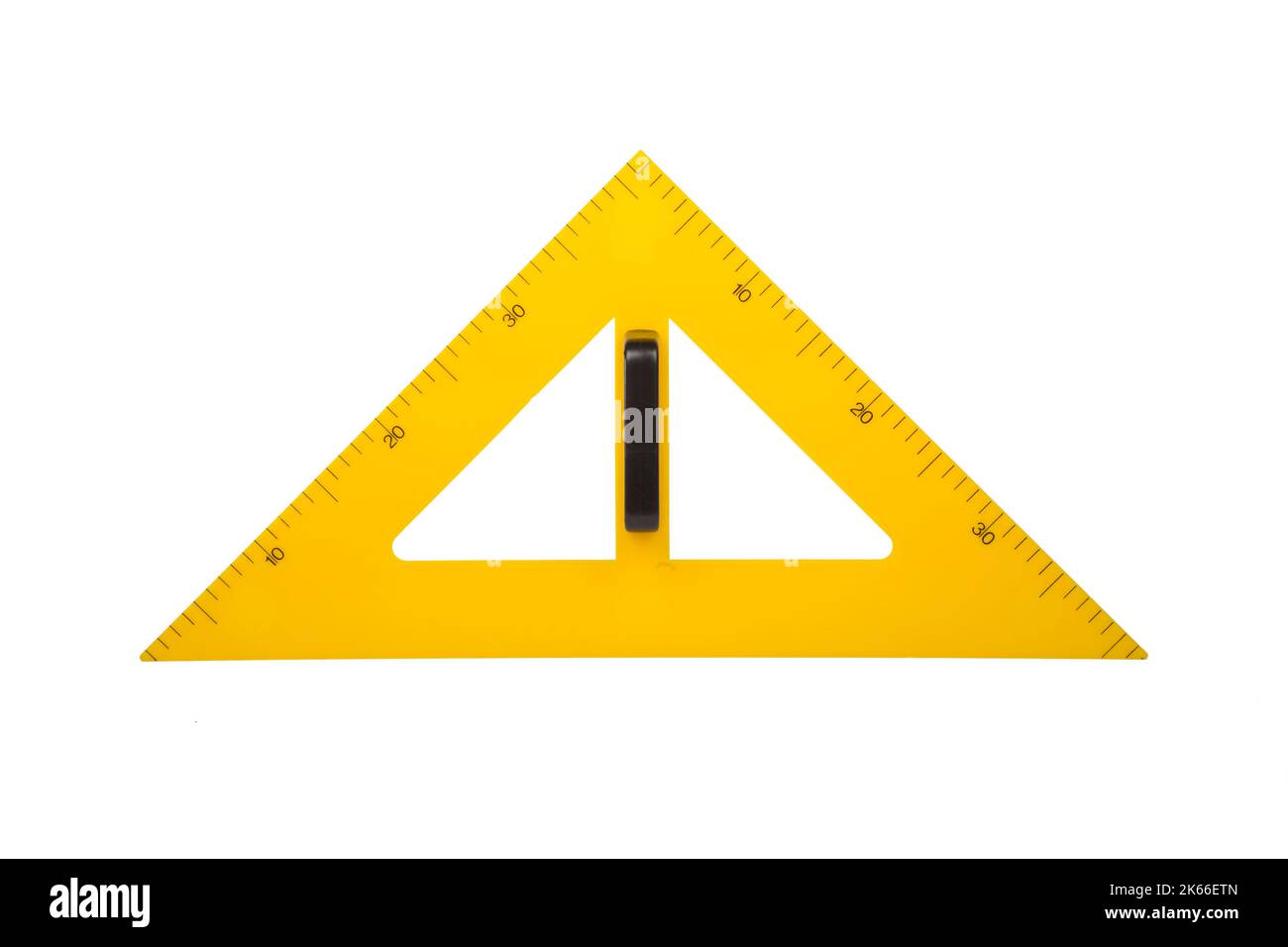 A yellow triangle ruler isolated on a white background Stock Photo - Alamy