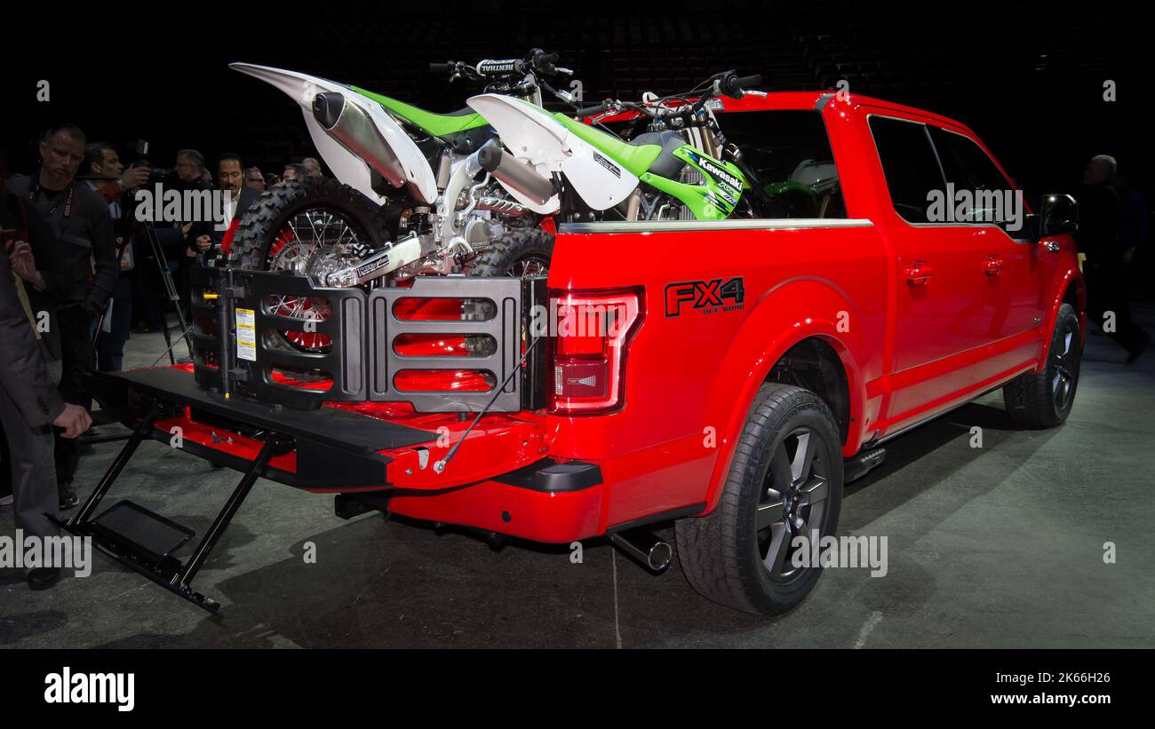 DETROIT, MI/USA - JANUARY 13: A 2014 Ford F150 FX4 truck carrying two ...
