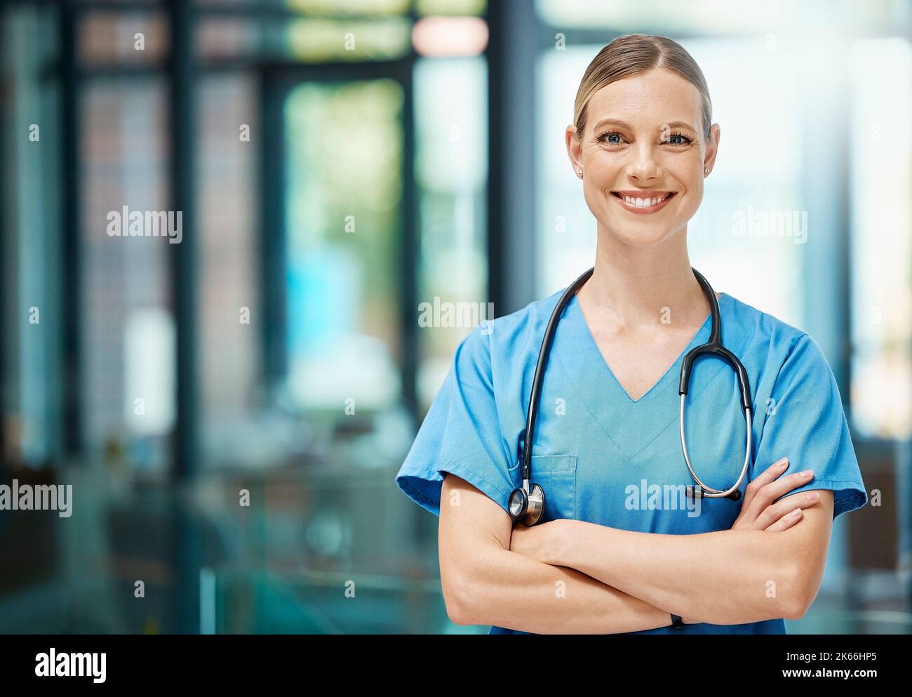 Lets makes your health a priority. a young female doctor standing with ...