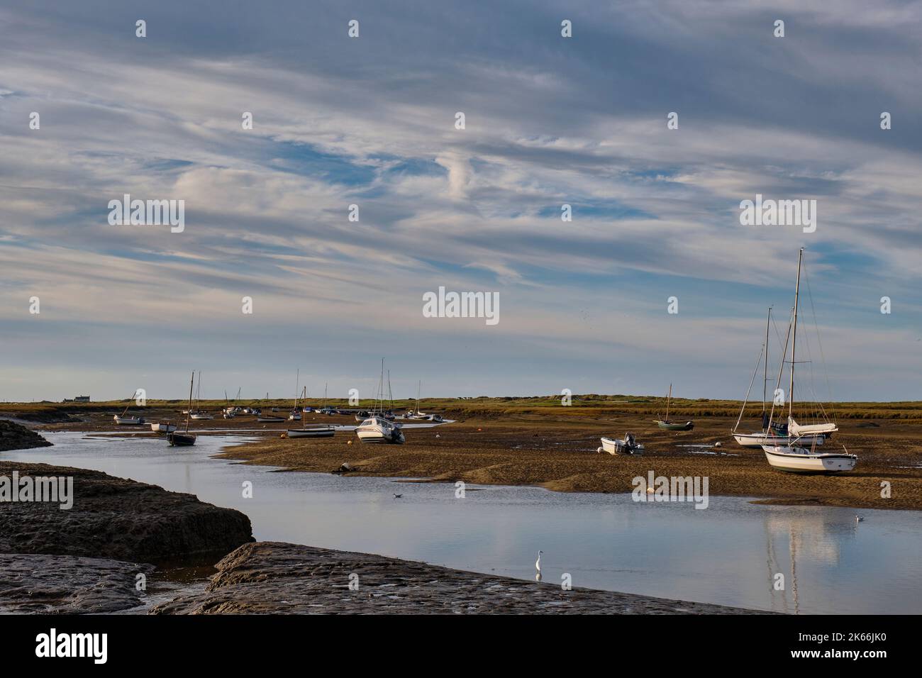 Boats at low tide at Brancaster Staithe, Norfolk Stock Photo - Alamy