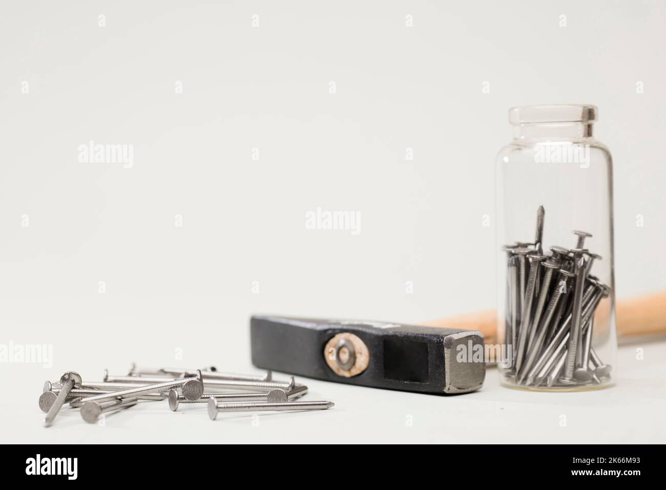 Hammer nails icon white hi-res stock photography and images - Alamy
