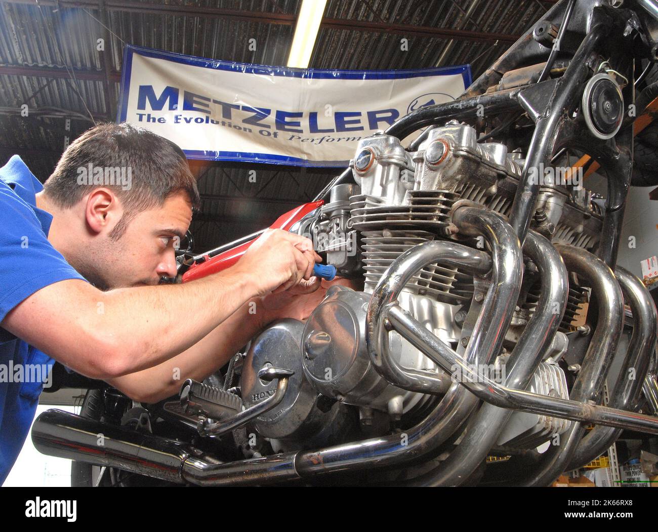 Small Engine Mechanic Stock Photo - Alamy