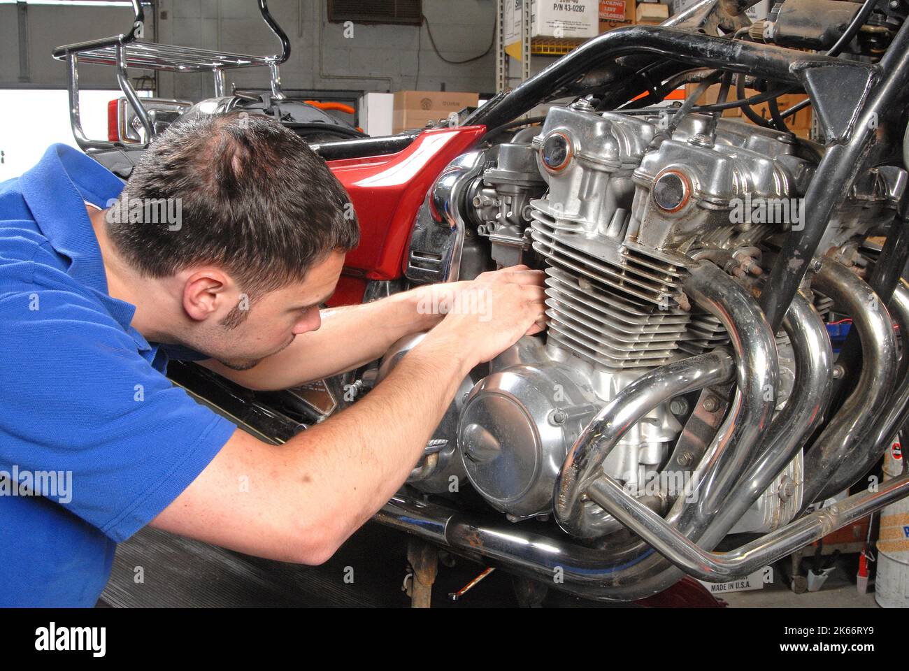 Small Engine Mechanic Stock Photo - Alamy