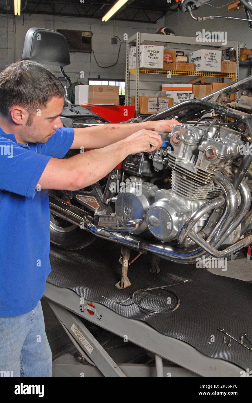 Small Engine Mechanic Stock Photo - Alamy