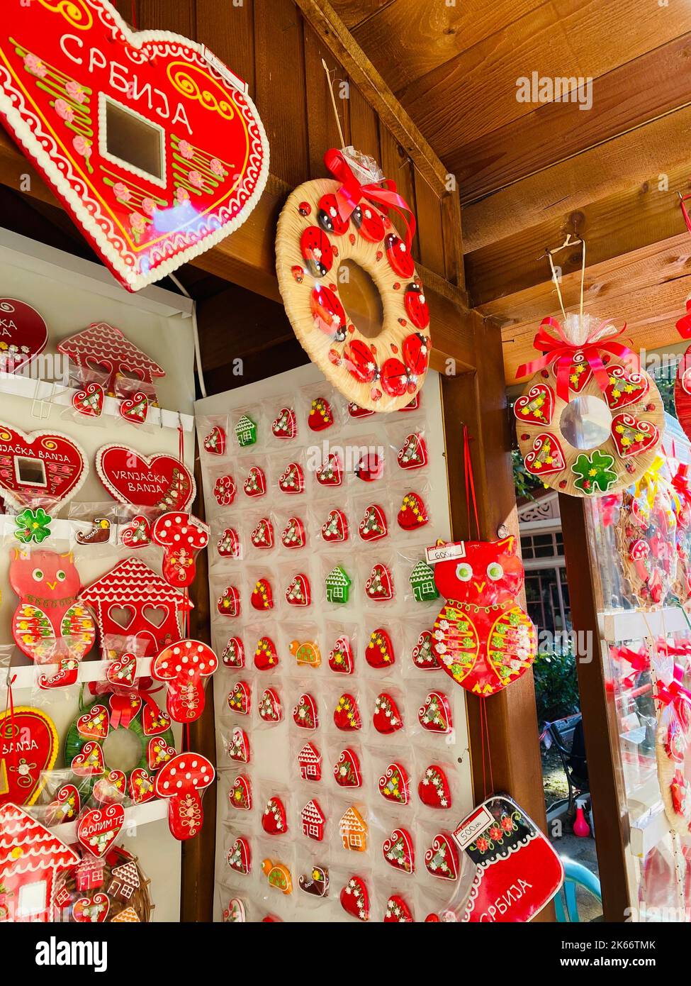 A vertical shot of red traditional Serbian sweets and souvenir shop in ...