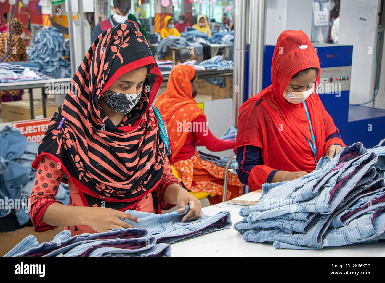 Gazipur, Dhaka, Bangladesh. 12th Oct, 2022. Workers make clothes at a ...