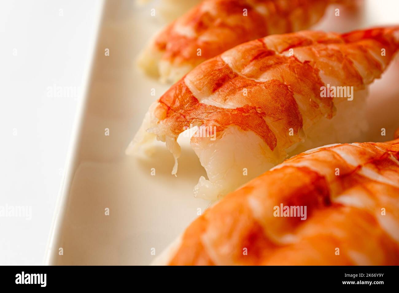Black tiger prawn sushi on white background Stock Photo - Alamy