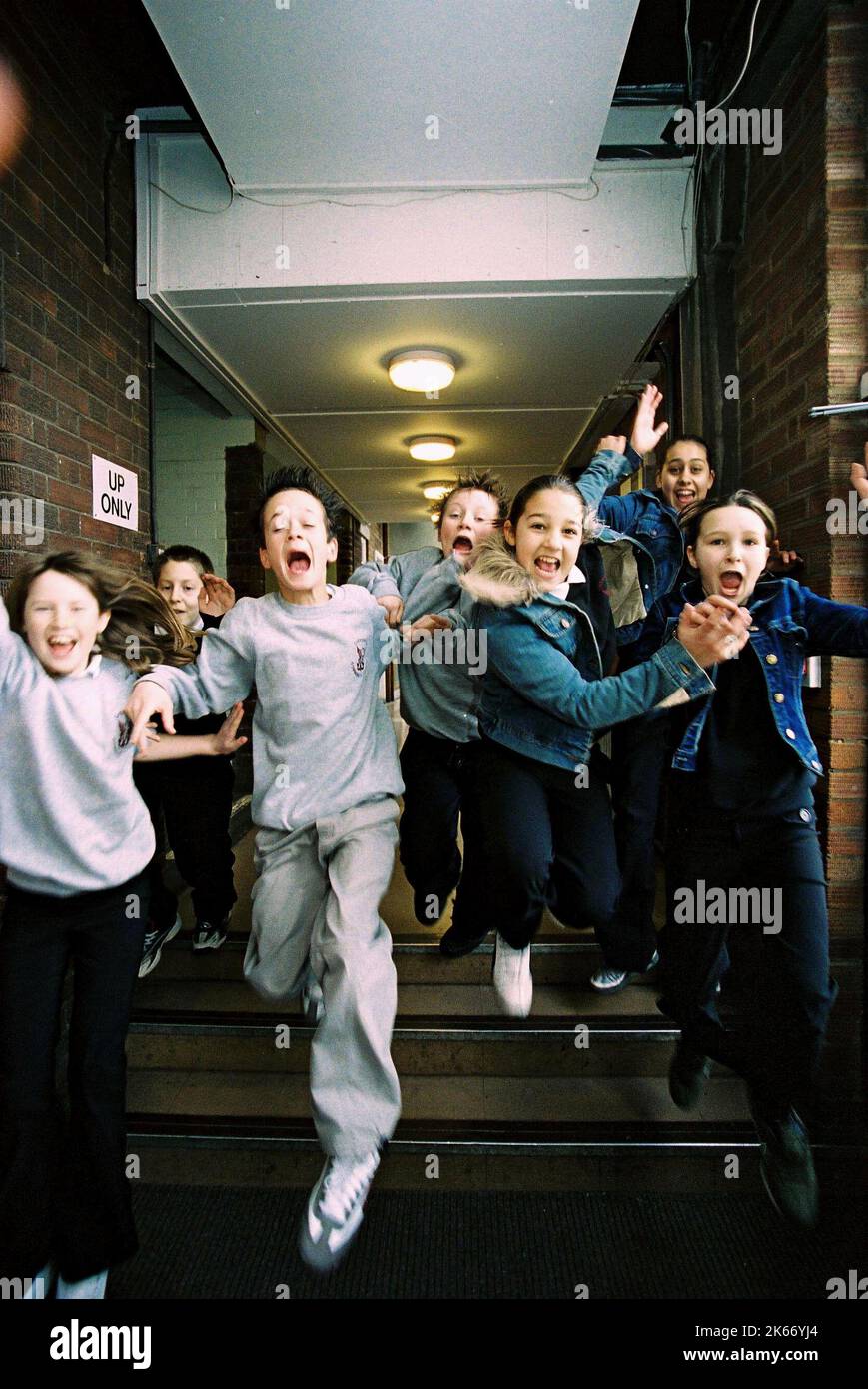 SCHOOL PUPILS, STEPPING UP, 2003 Stock Photo - Alamy