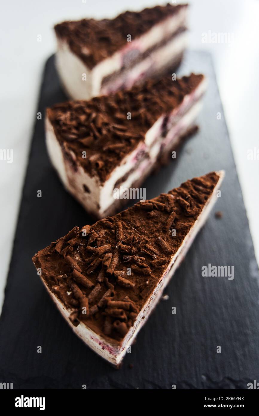 Triangular slice layered cake hi-res stock photography and images - Alamy