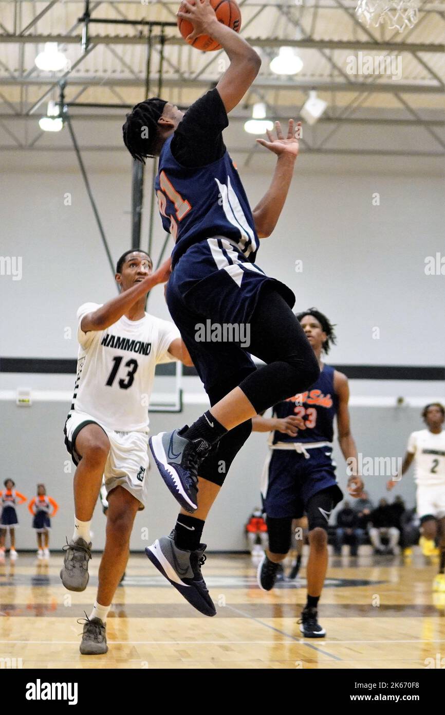 A vertical shot of a player scoring during the Hammond vs Westside High ...