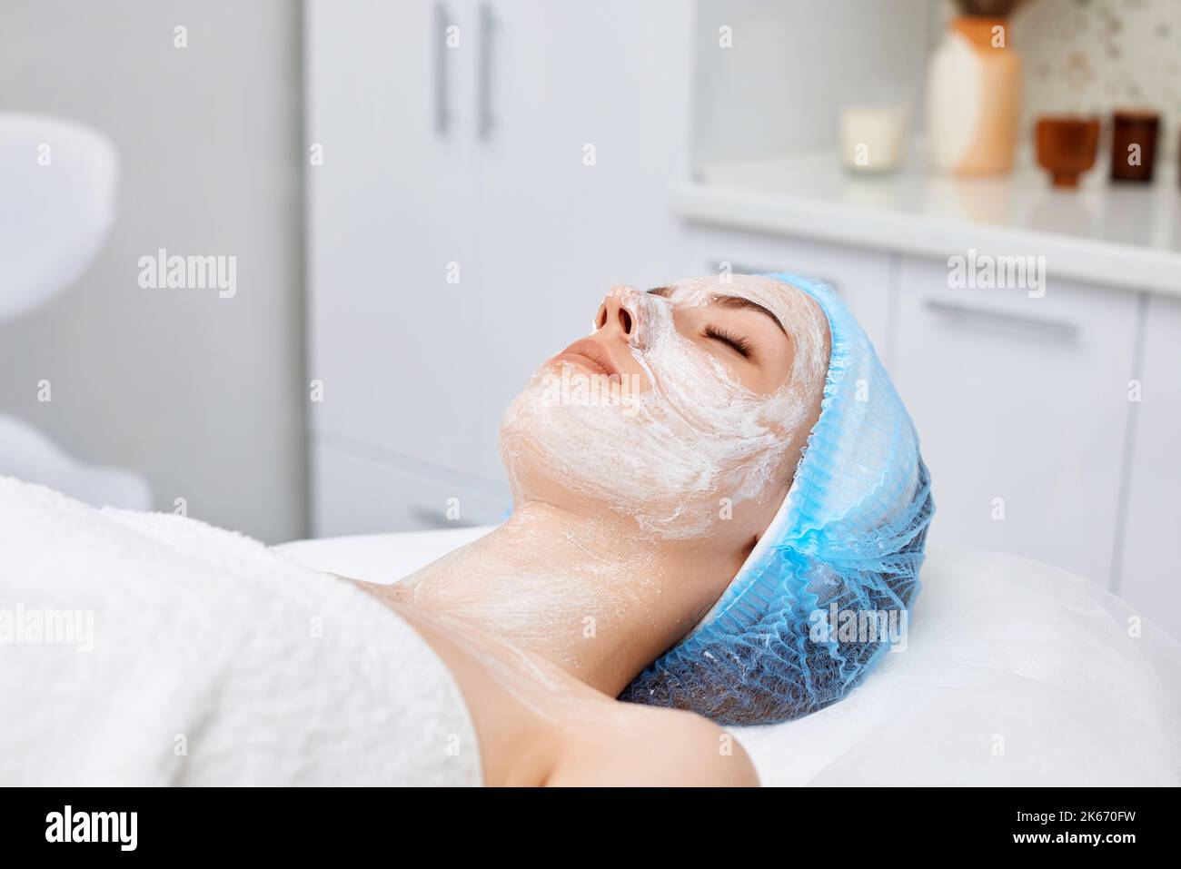 beautiful woman with blue alginate mask on face Stock Photo - Alamy