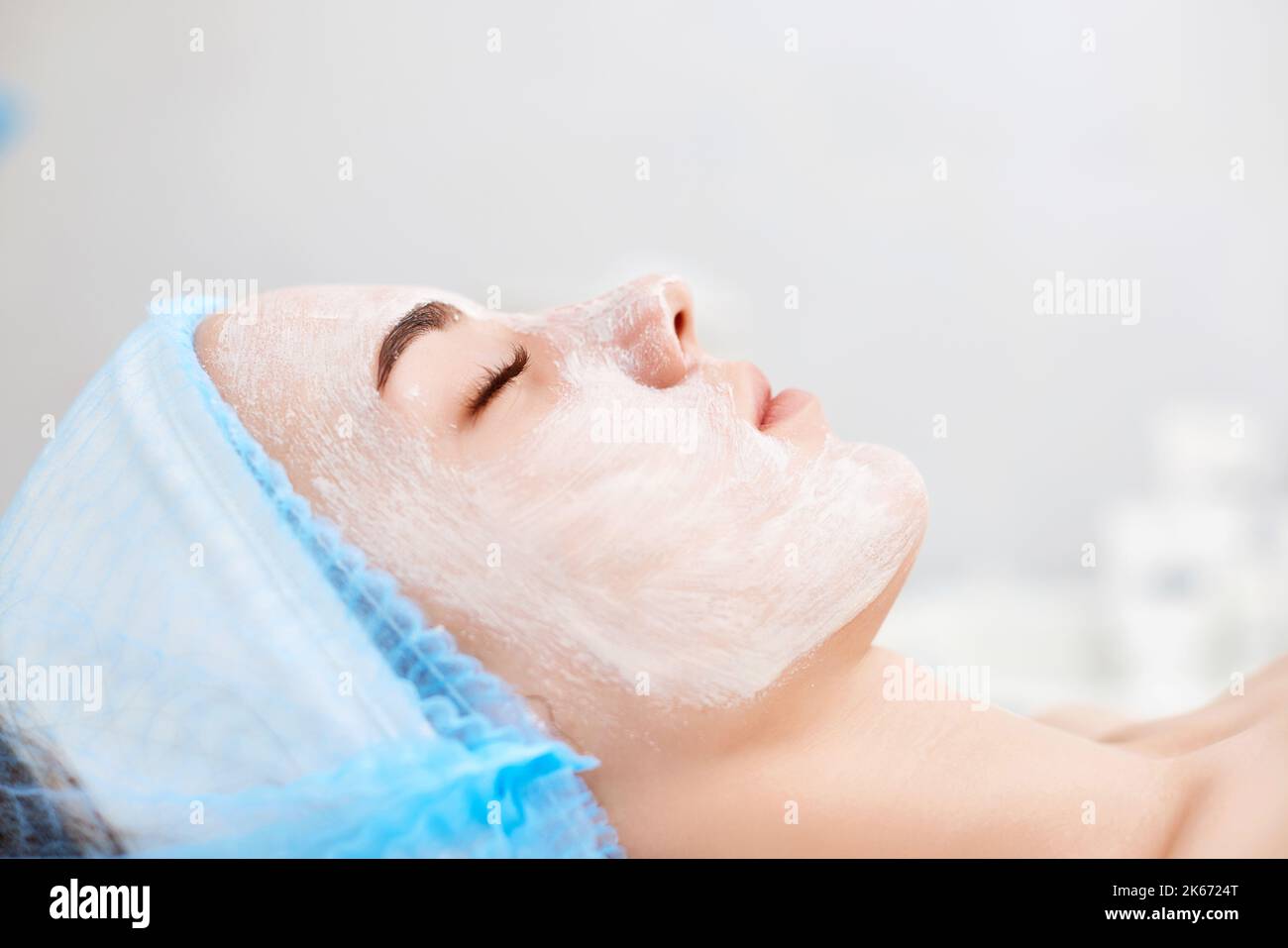 beautiful woman with blue alginate mask on face Stock Photo - Alamy