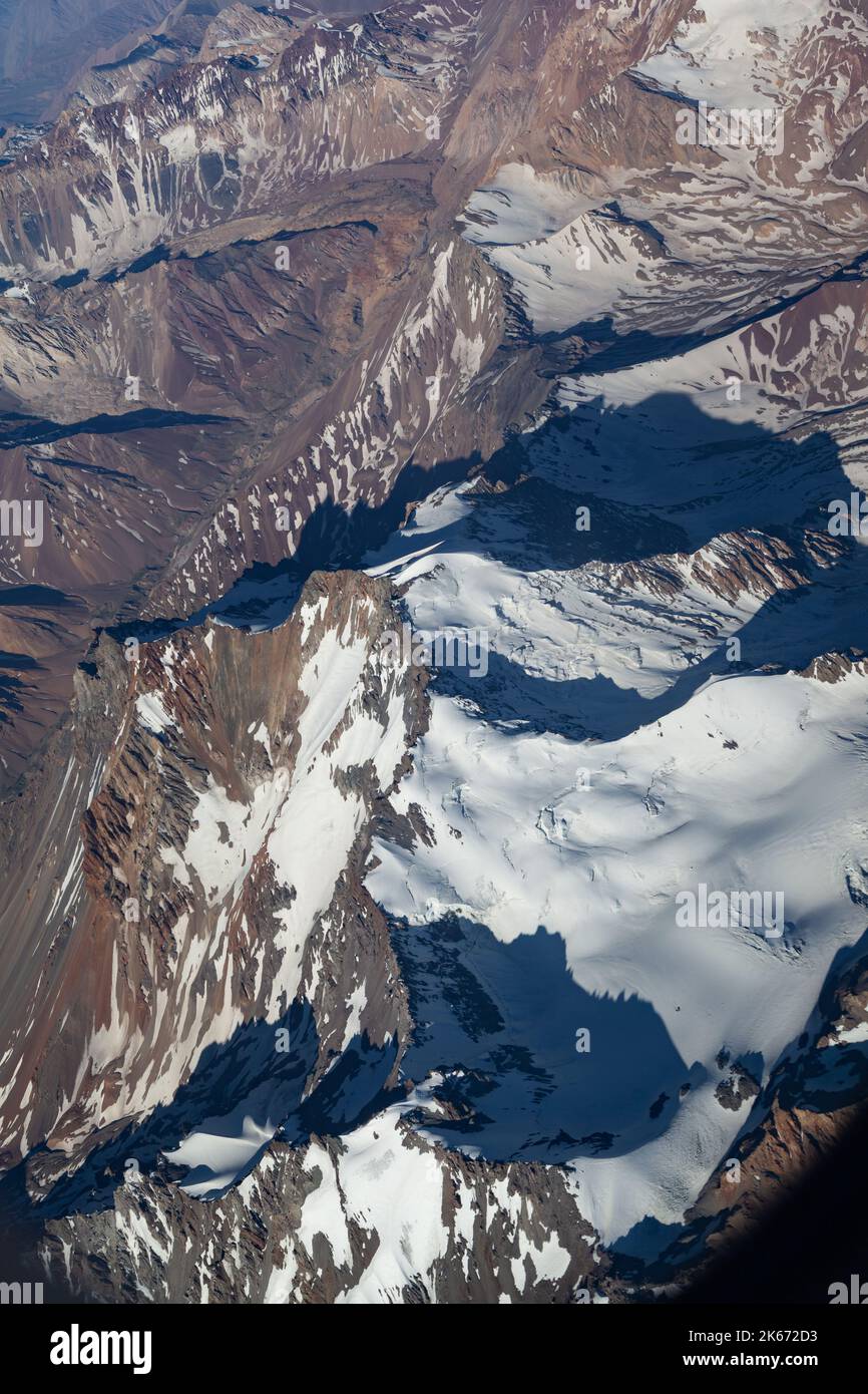 Aerial beautiful scenery of snow-covered landscape of Andes Mountains ...
