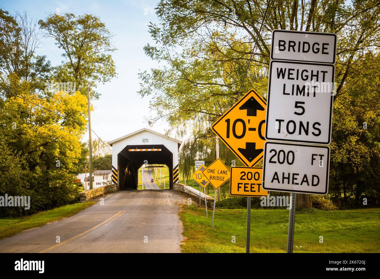 Different road sign placed before bridge in Lancaster, Pennsylvania ...