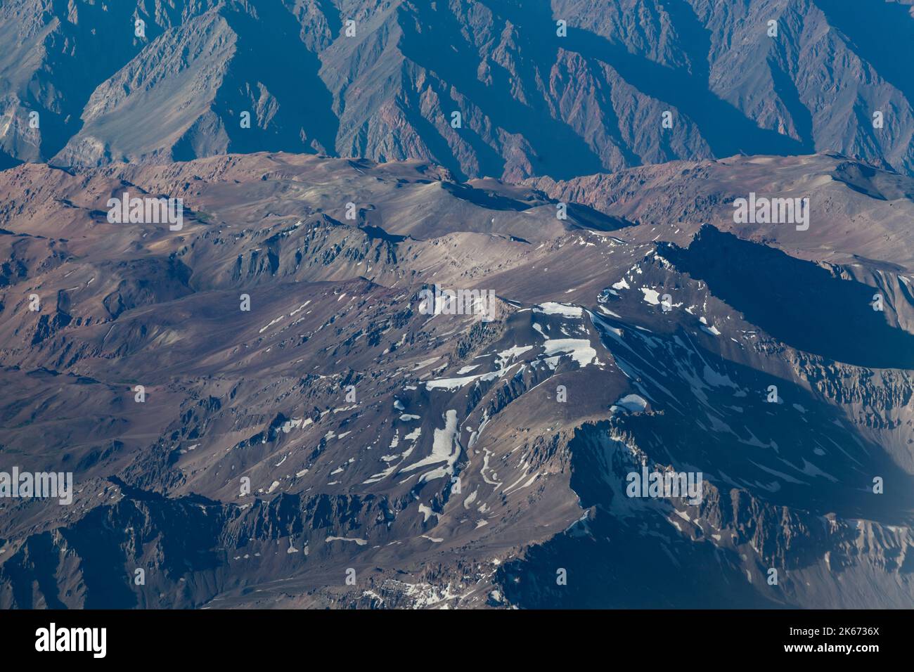 Aerial beautiful scenery of snow-covered landscape of Andes Mountains ...