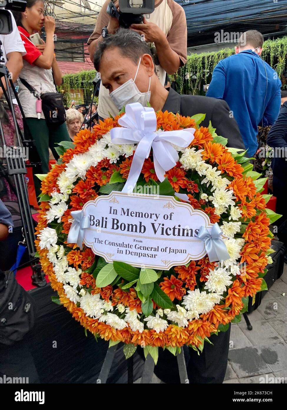 12 October 2022, Indonesia, Kuta: A funeral wreath in memory of the ...