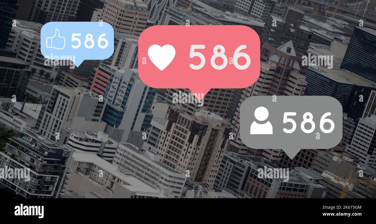 Image of social media reactions over cityscape Stock Photo - Alamy