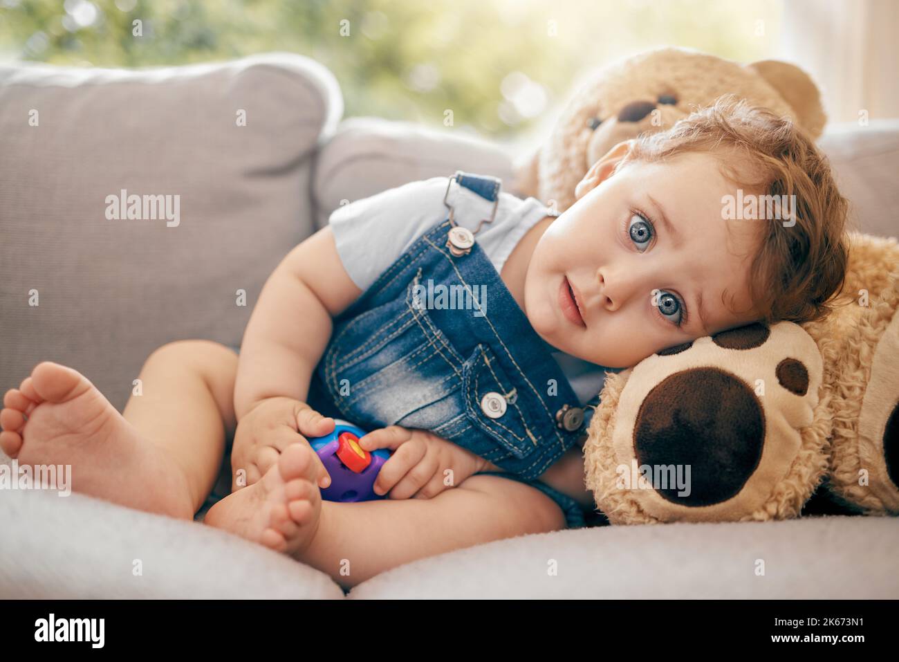 You stole my breath, embraced my heart. a boy on the sofa at home Stock ...