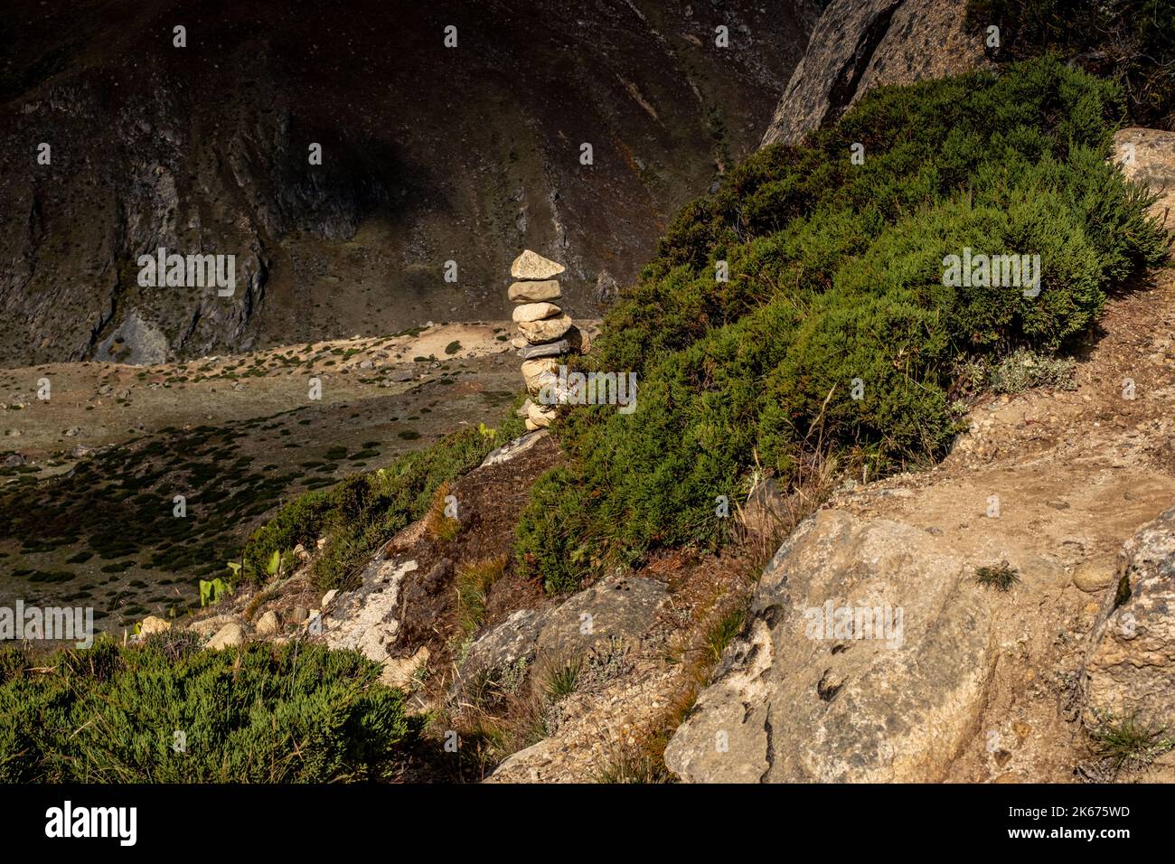 Stone Carin jutting out on the path to Mt Everest base camp high in the ...