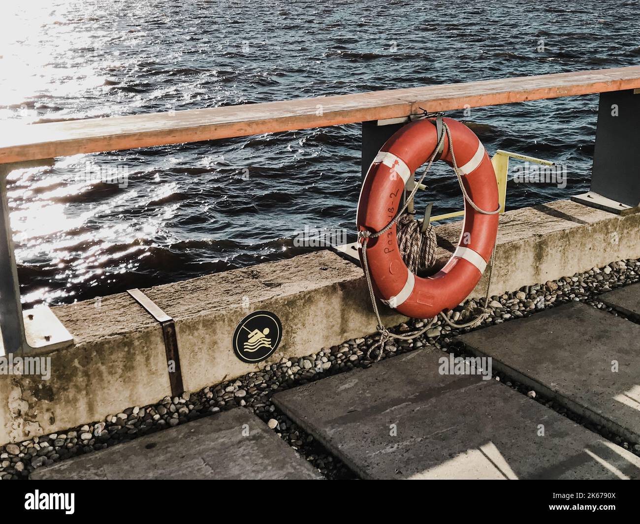 life ring sign swimming forbidden waves pier rules ocean Stock Photo ...