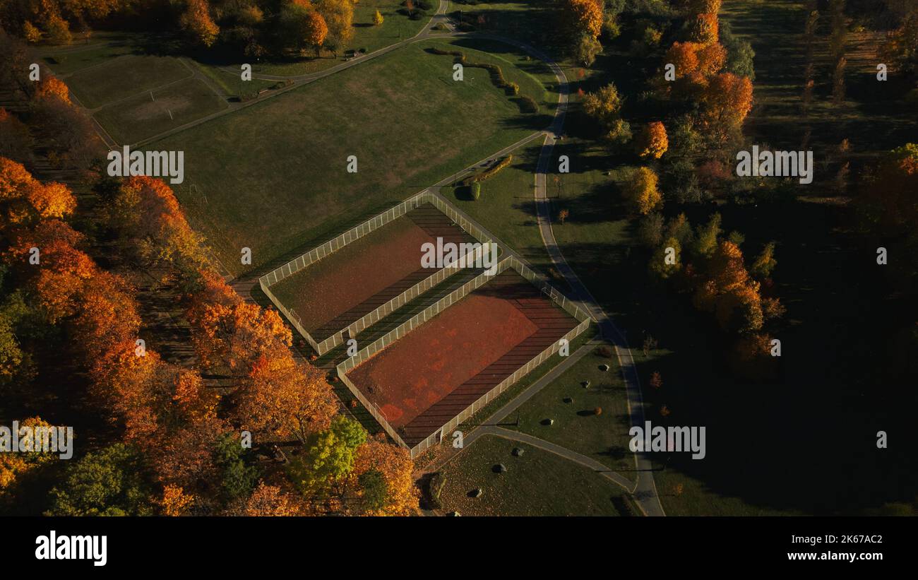 Autumn city park. Trees with colorful leaves. Sports grounds. Autumn ...