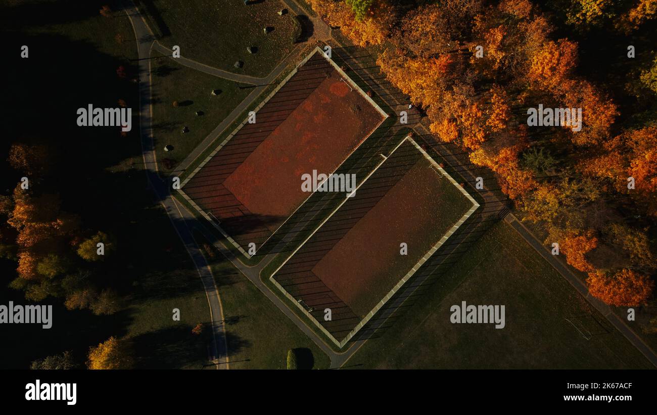 Autumn city park. Trees with colorful leaves. Sports grounds. Autumn ...