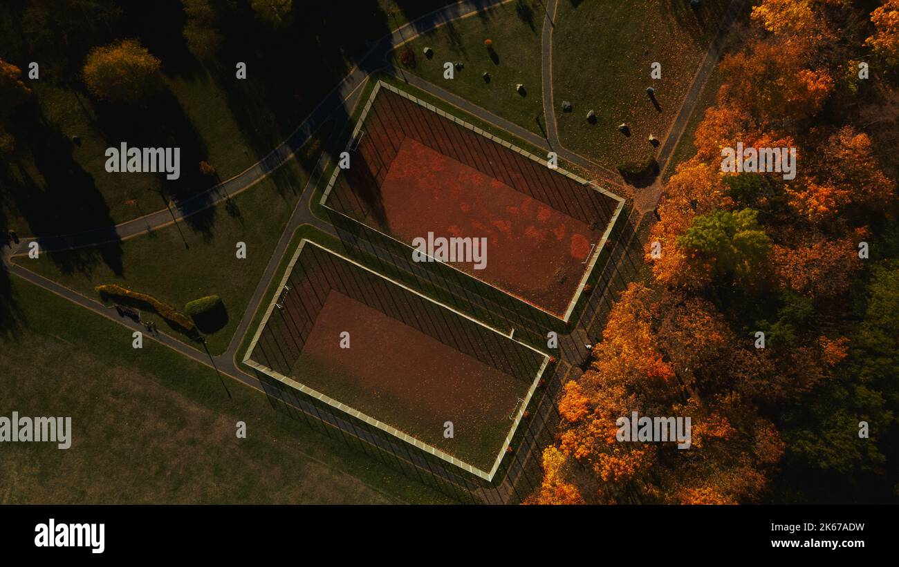 Autumn city park. Trees with colorful leaves. Sports grounds. Autumn ...