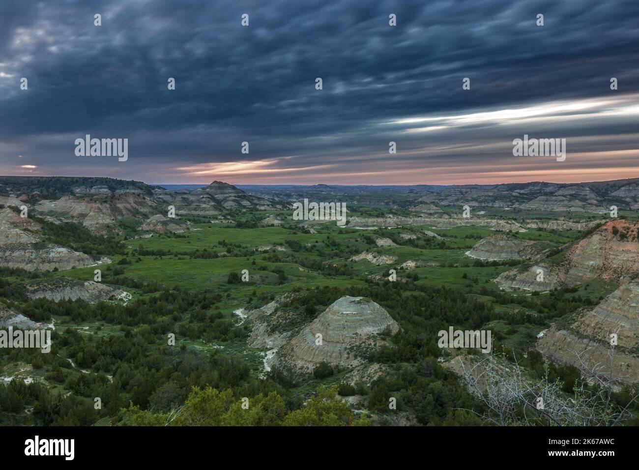 A scenic view of the Theodore Roosevelt National Park on a cloudy day ...
