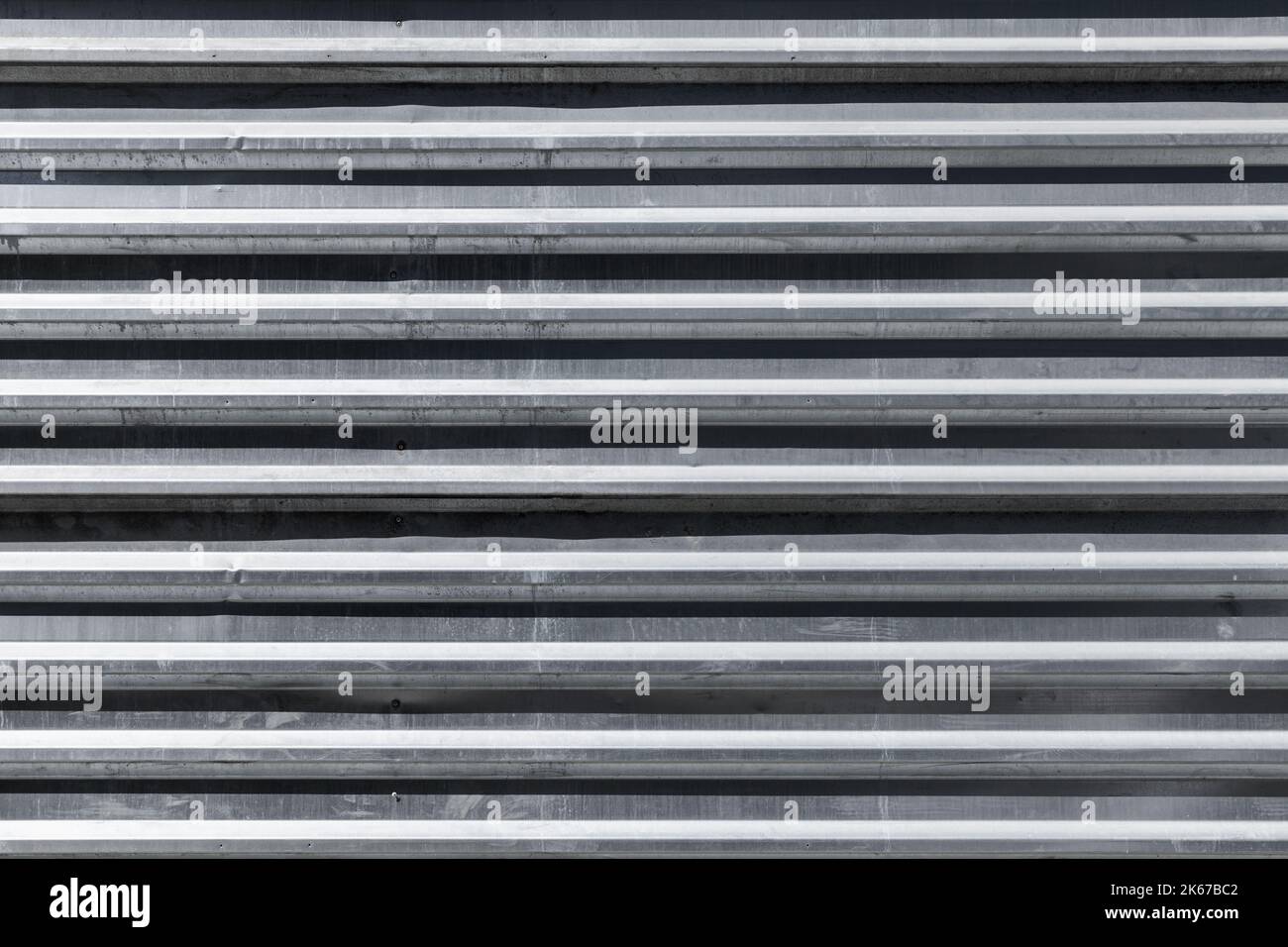 Abstract background photo texture of corrugated metal wall, front view ...